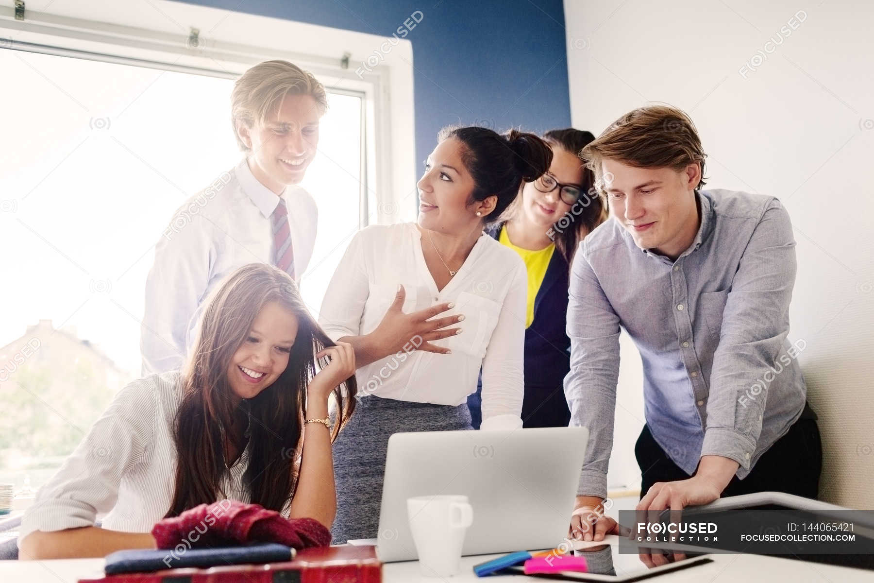 Business people discussing over laptop — computers, activity - Stock ...