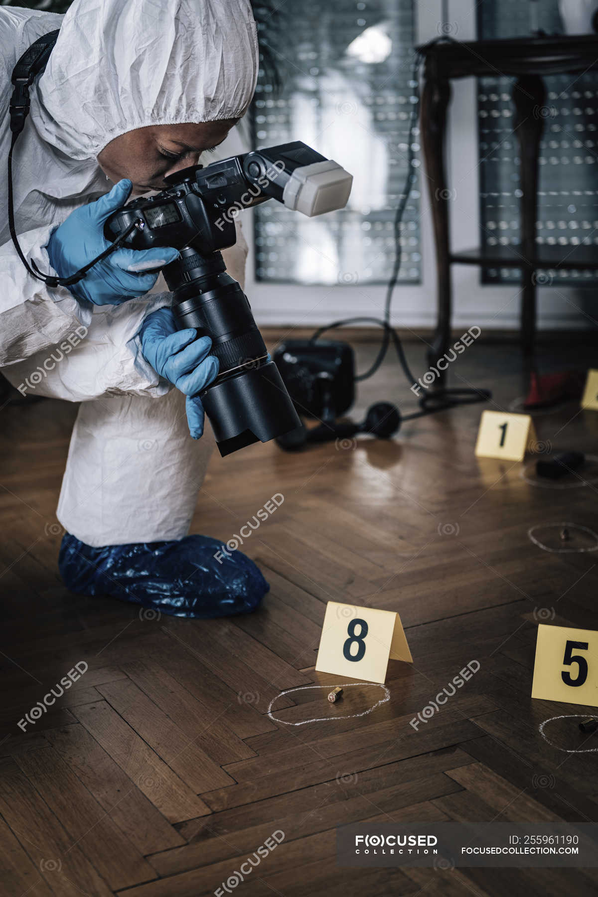 Forensics expert photographing evidence at crime scene. — investigator, police - Stock Photo ...