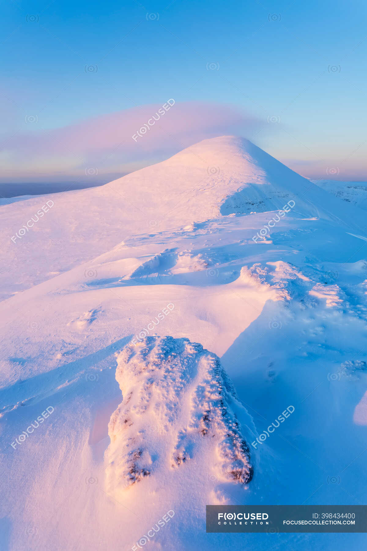 Snow drifts forming on the rocks along the peak of the Galty mountains ...