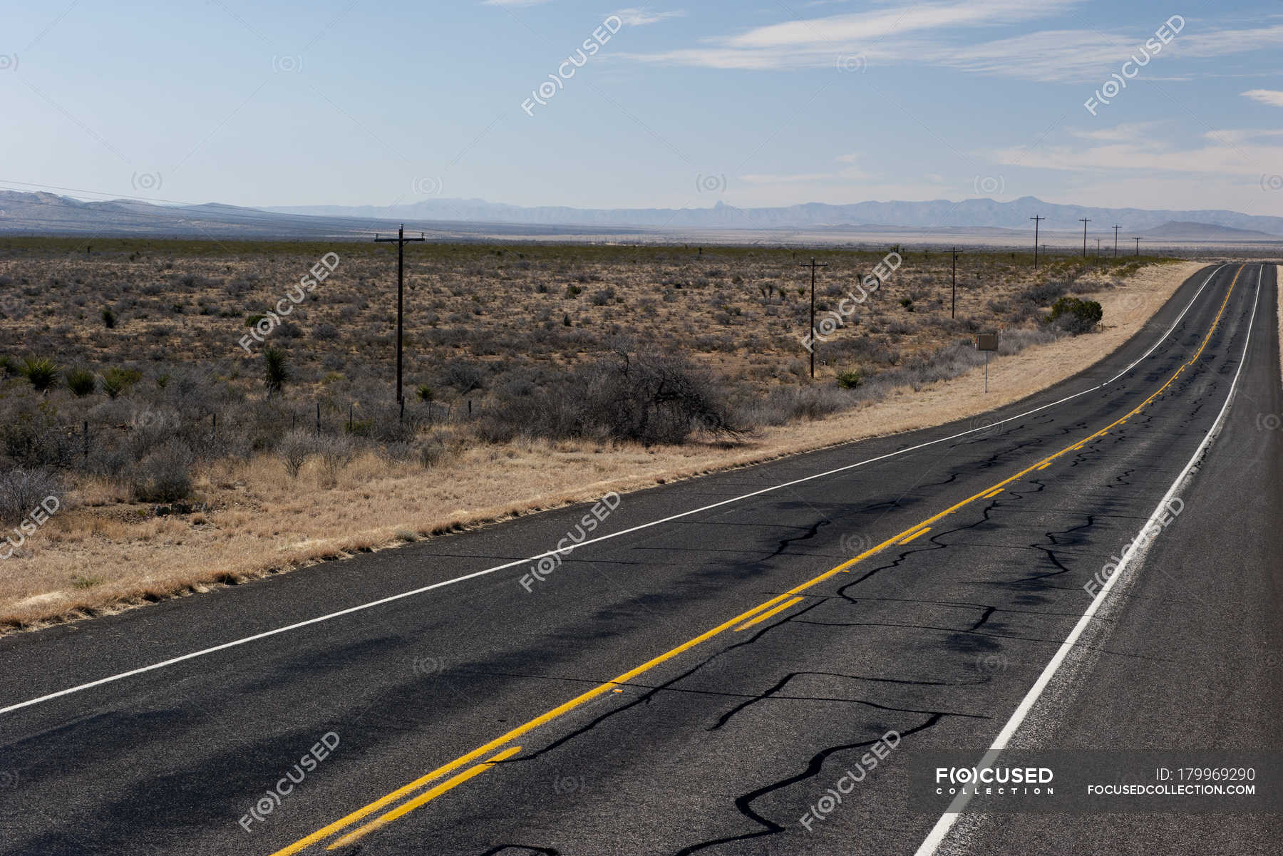 Empty Highway through arid landscape at daytime — travel, travel ... Empty Highway through arid landscape at daytime — travel, travel ...