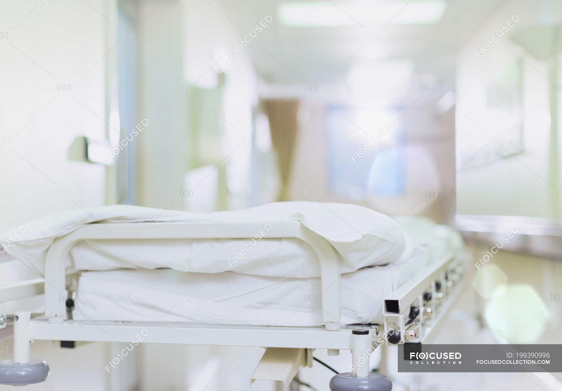 Stretcher in empty hospital corridor, closeup — indoors, clinic - Stock ... Stretcher in empty hospital corridor, closeup — indoors, clinic - Stock ...