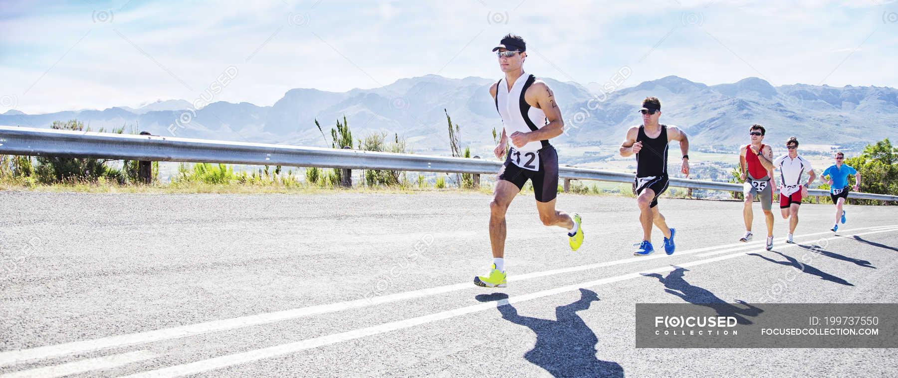 Runners in race on rural road — five people, people - Stock Photo ...