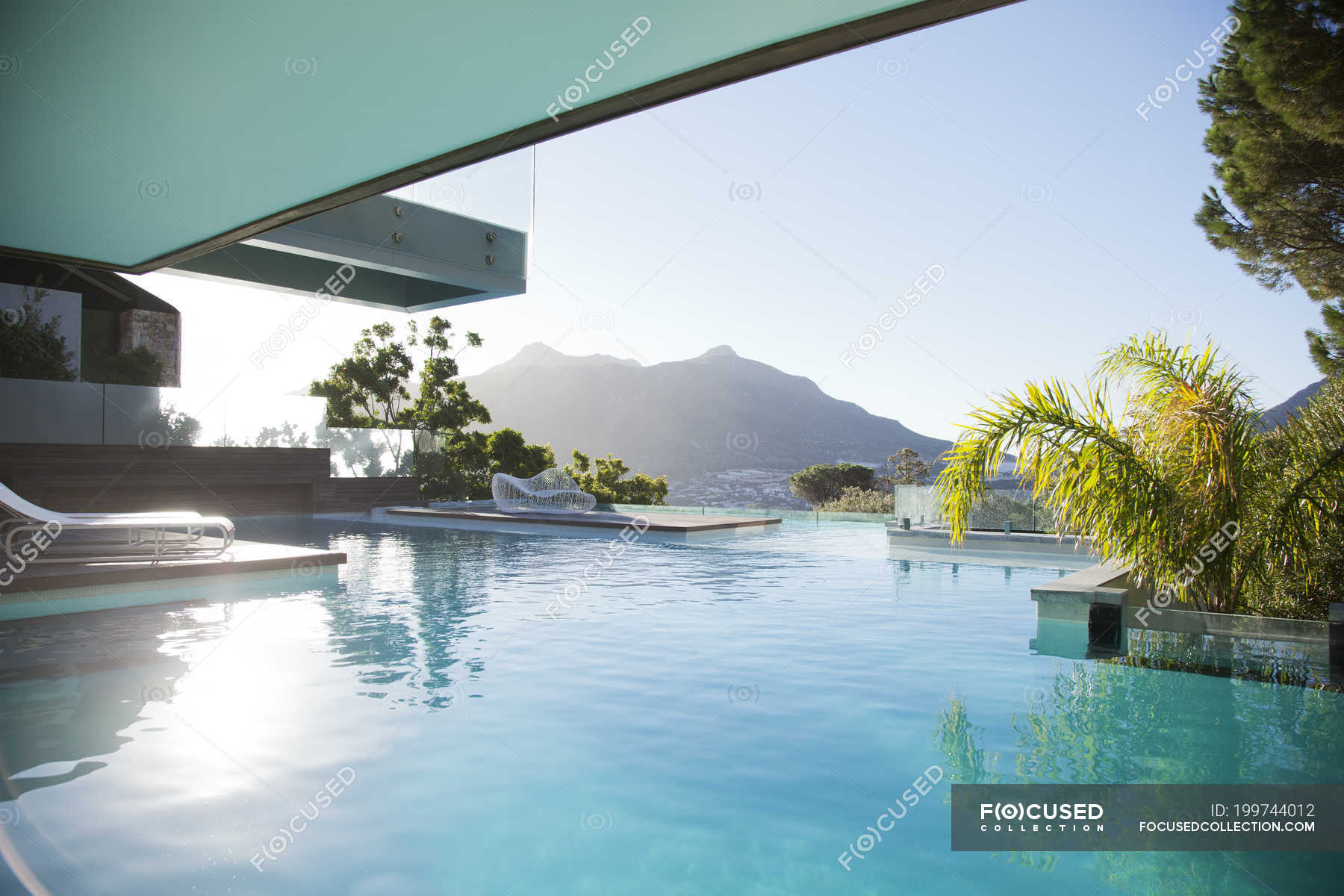 Luxury swimming pool with mountain view — real estate, apartment ...