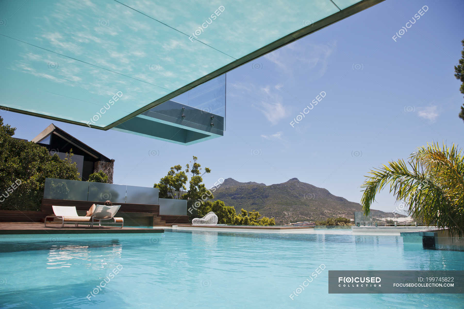 Luxury swimming pool with mountain view — sunny, style - Stock Photo ...