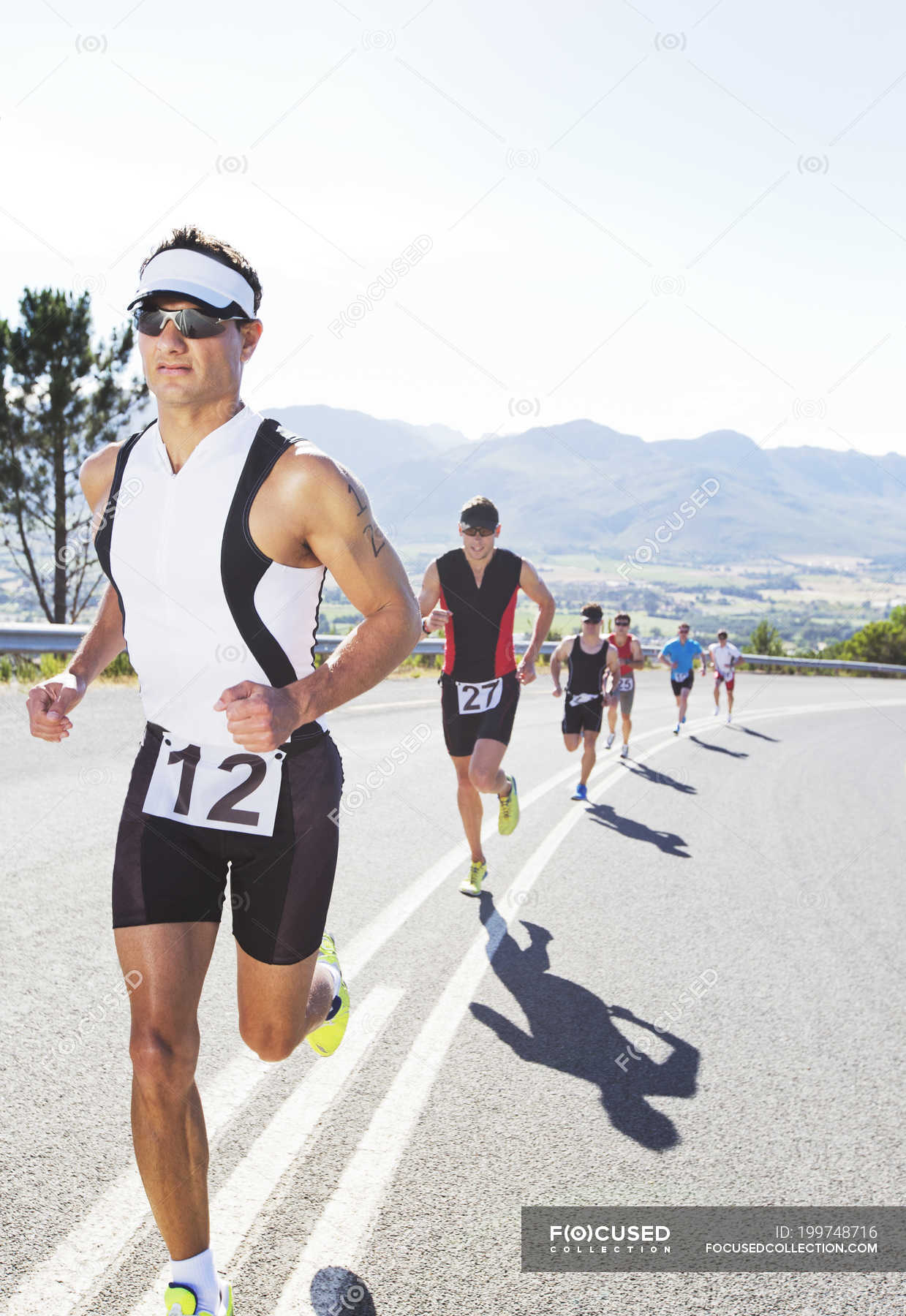 Runners in race on rural road — caucasian, healthy living - Stock Photo ...