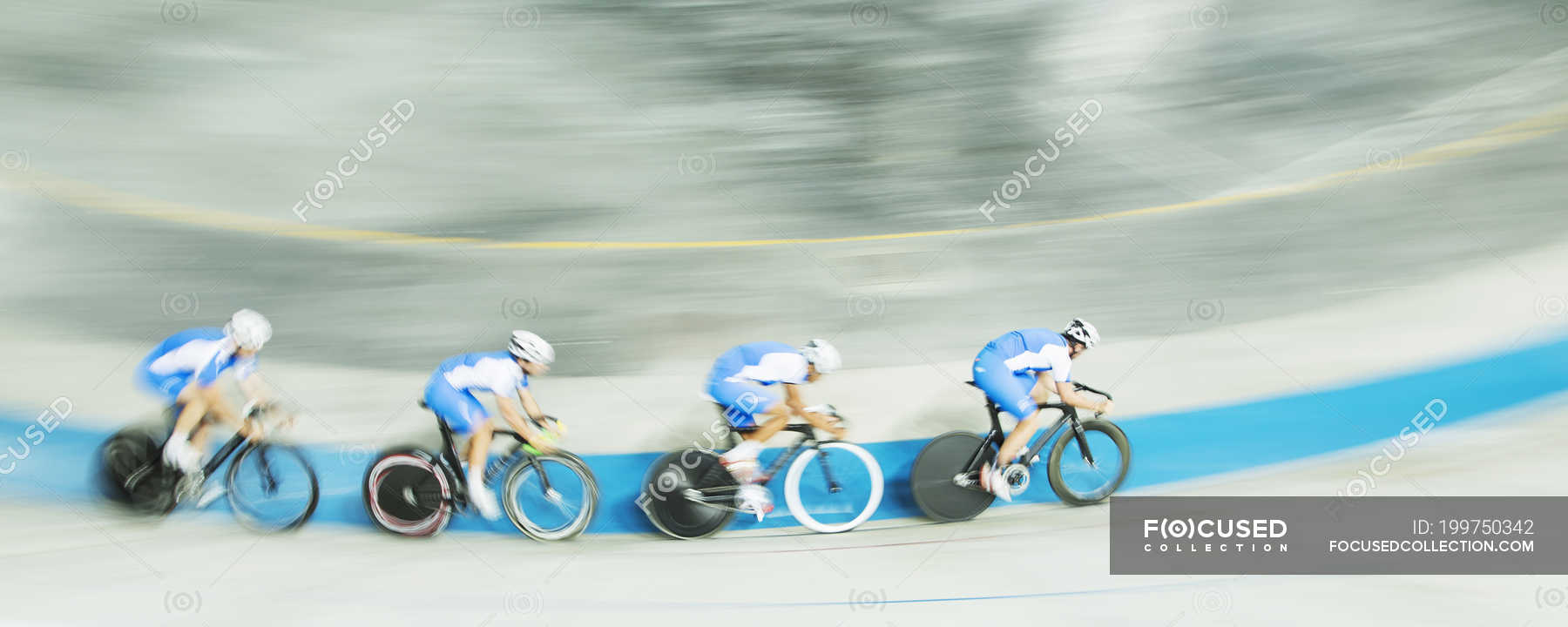 Track cycling team racing in velodrome — High Angle View, Men - Stock ...