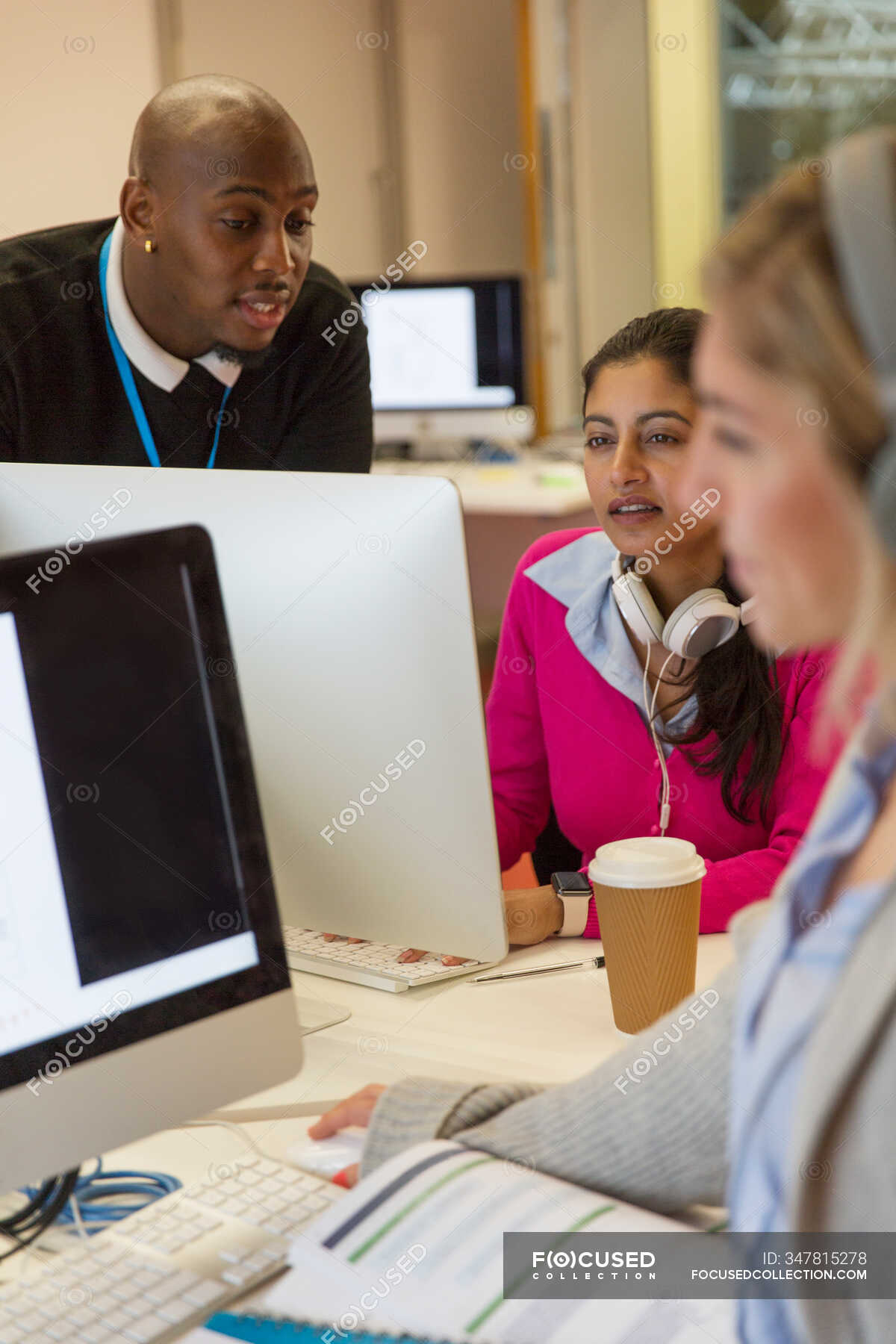 Students working at computers in classroom — online, Computer Lab ...