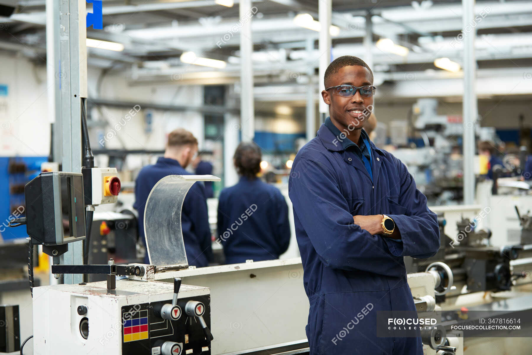 Portrait confident teenage boy student in shop class — Youth Culture ... Portrait confident teenage boy student in shop class — Youth Culture ...