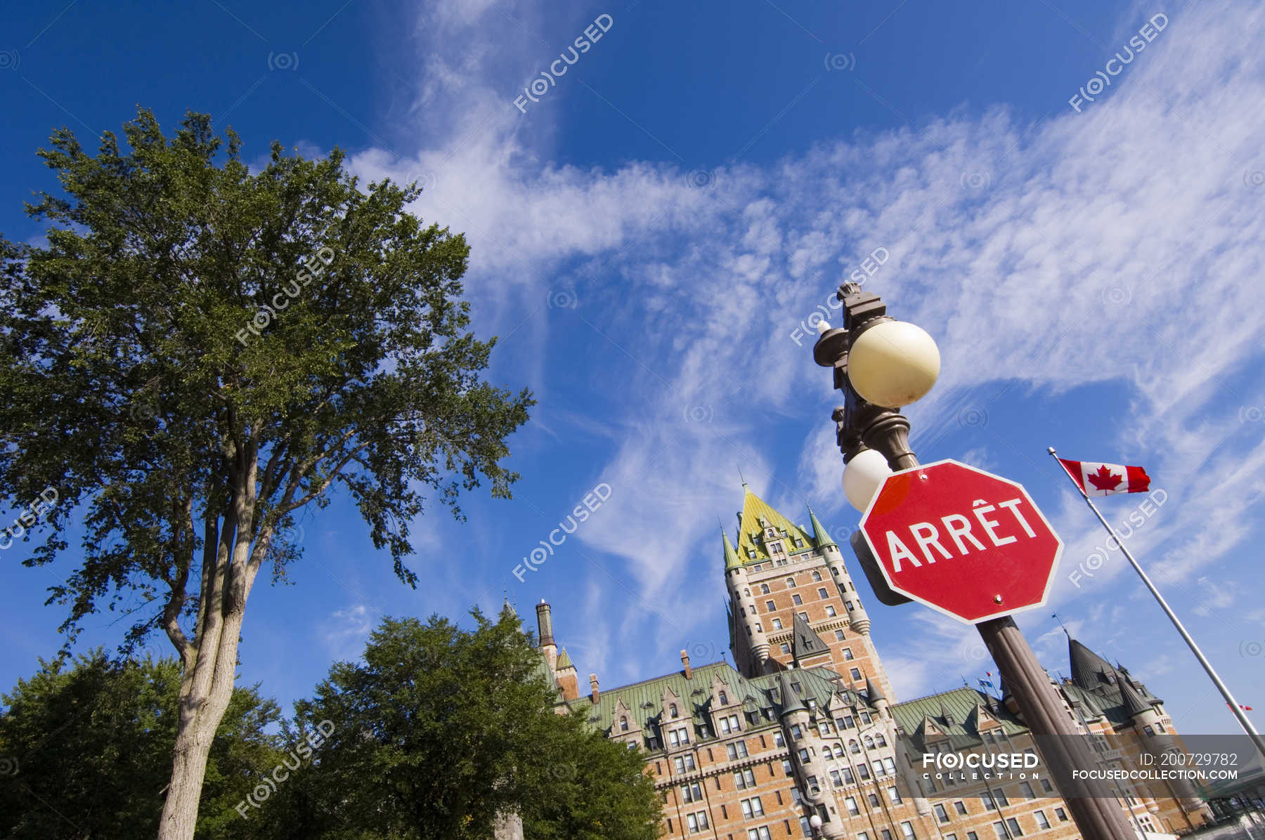 Chateau Frontenac with french language stop sign, Quebec City, Quebec ...