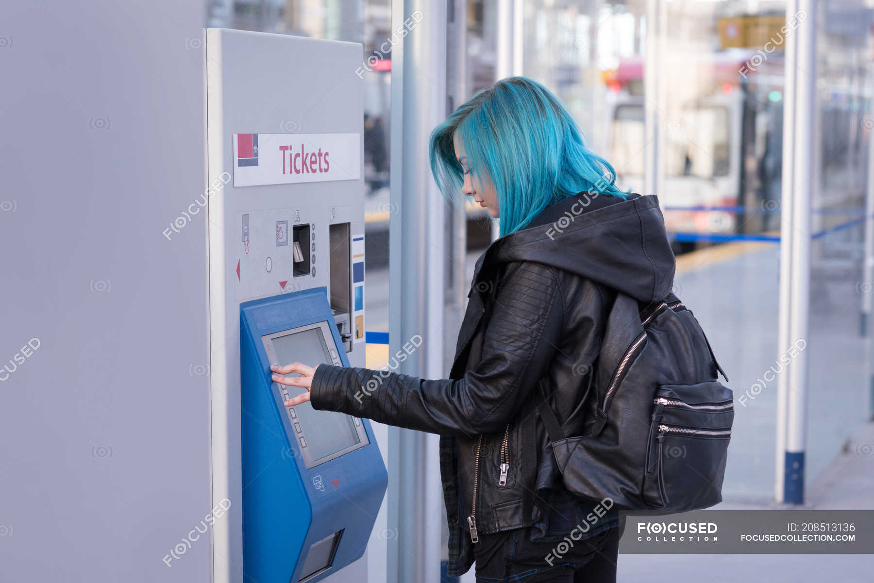 Stylish woman using ticket vending machine at station — journey, modern ...