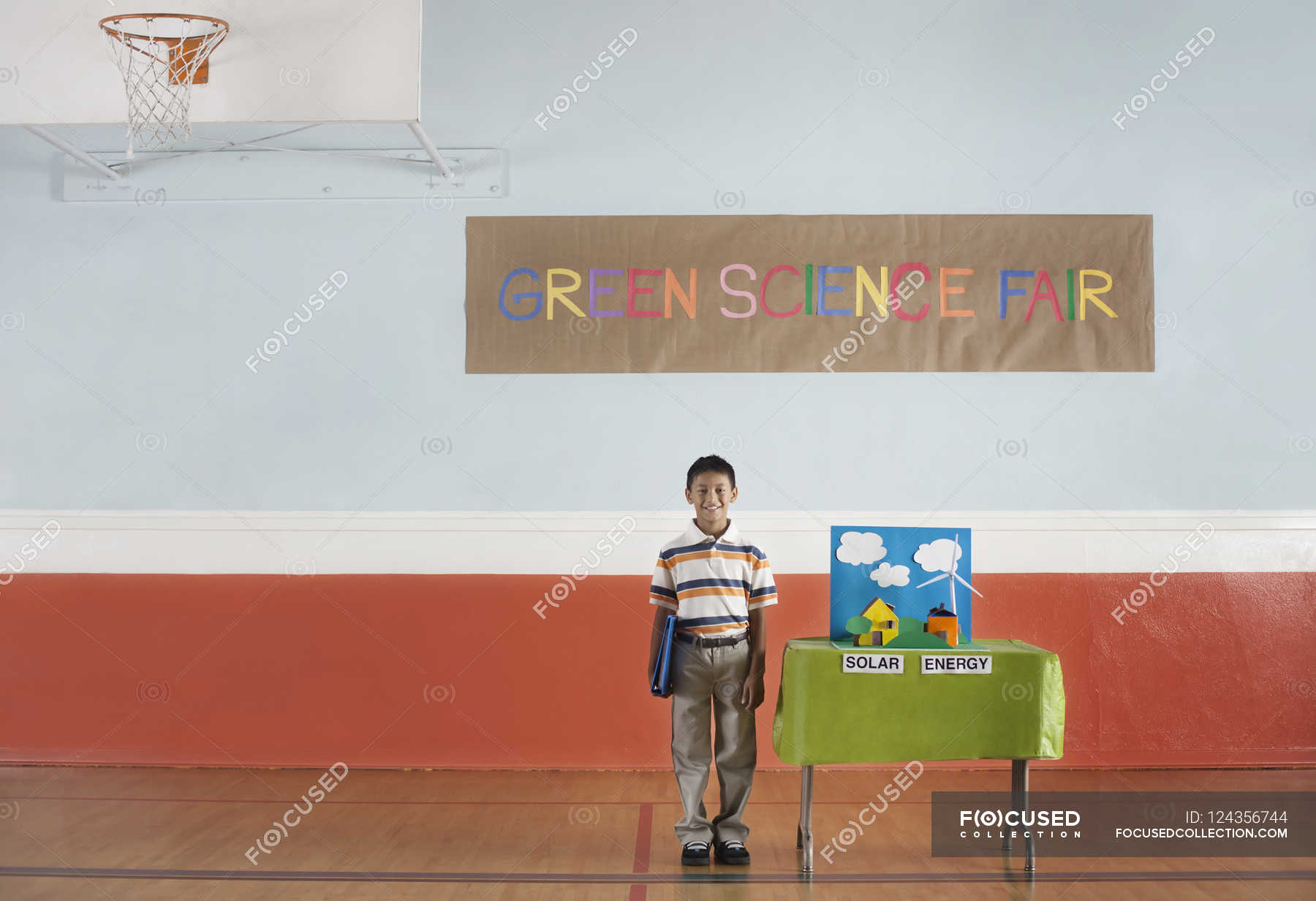 Boy at Green Science Fair sign — elementary school building, GREEN ...