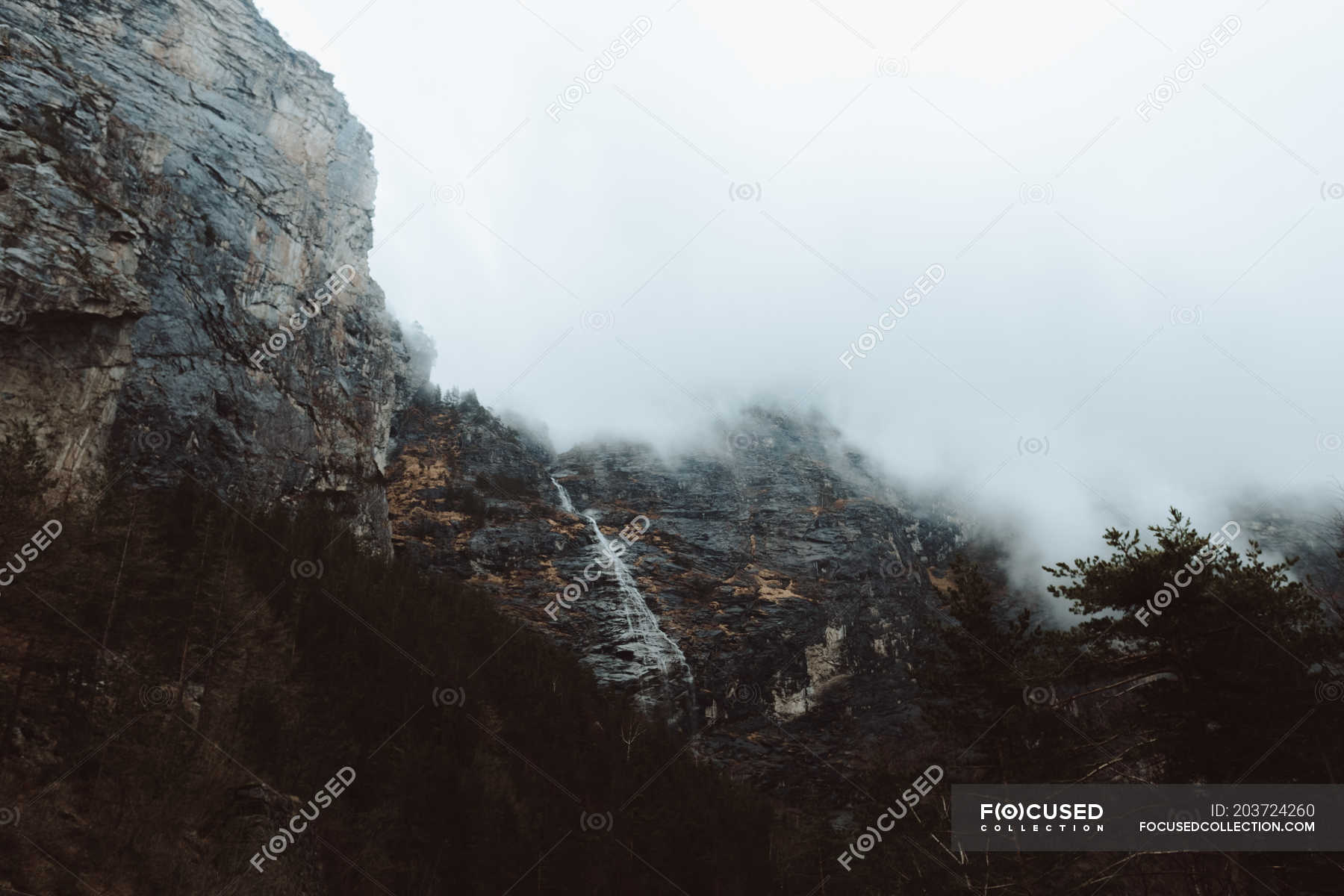Rocky mountains covered with fog — nature, discovery - Stock Photo ...