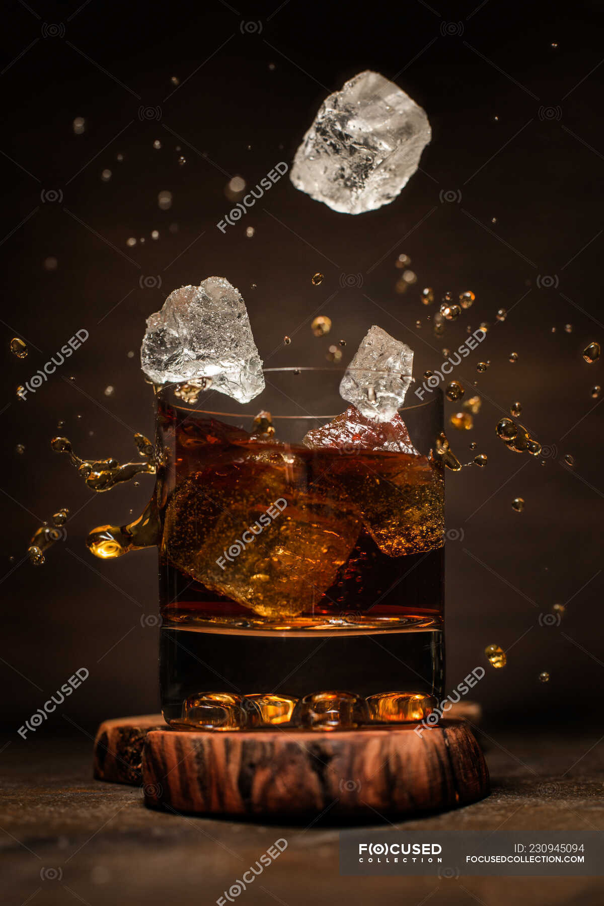 Splashing whiskey with ice cubes — alcohol, fresh - Stock Photo | #230945094