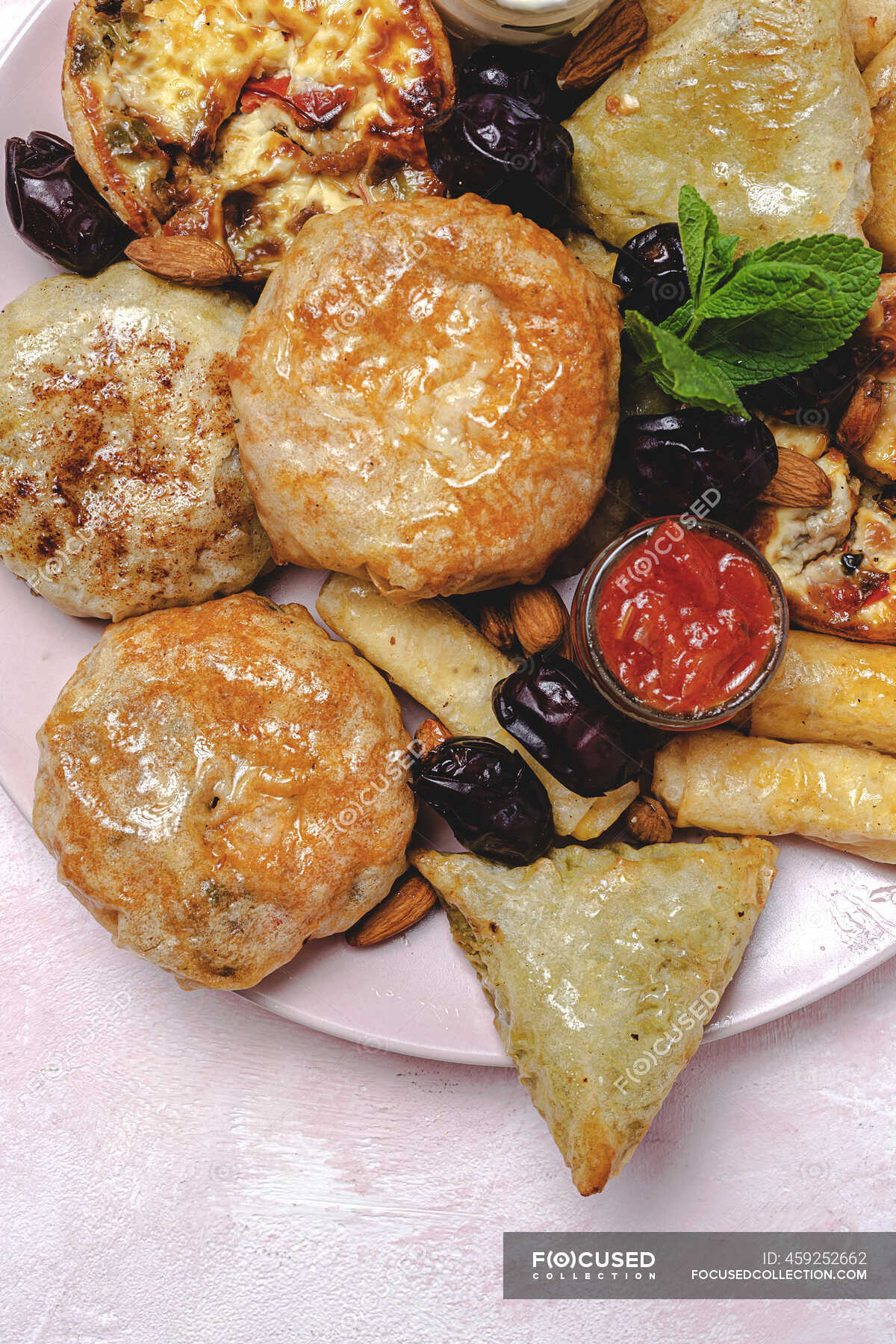 High angle of assorted tasty Arabic food with salsa and fresh mint ...