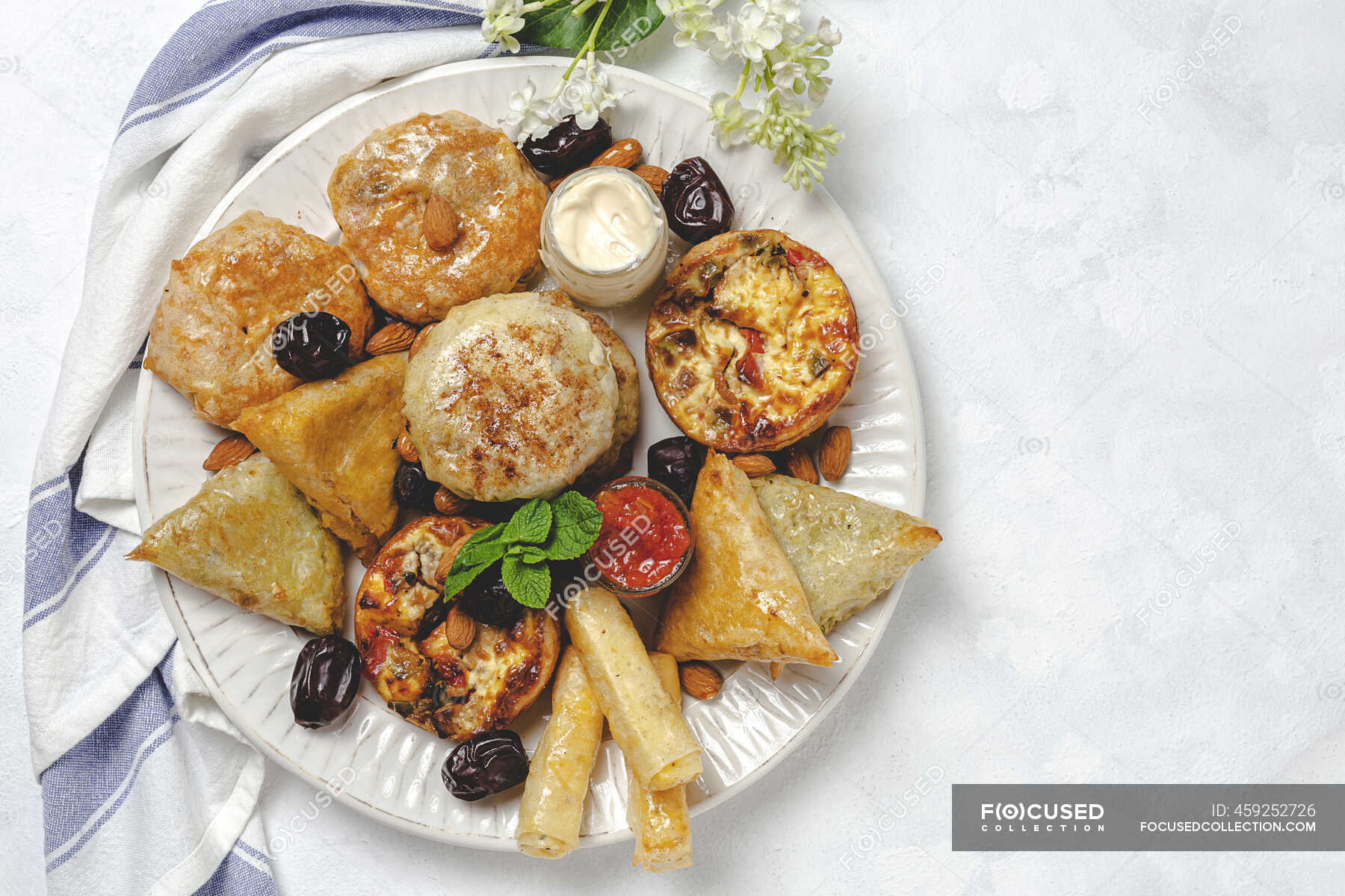 High angle of assorted tasty Arabic food with salsa and fresh mint ...