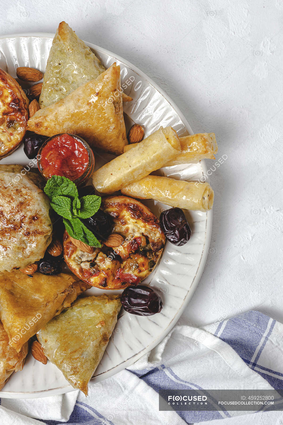 High angle of assorted tasty Arabic food with salsa and fresh mint ...