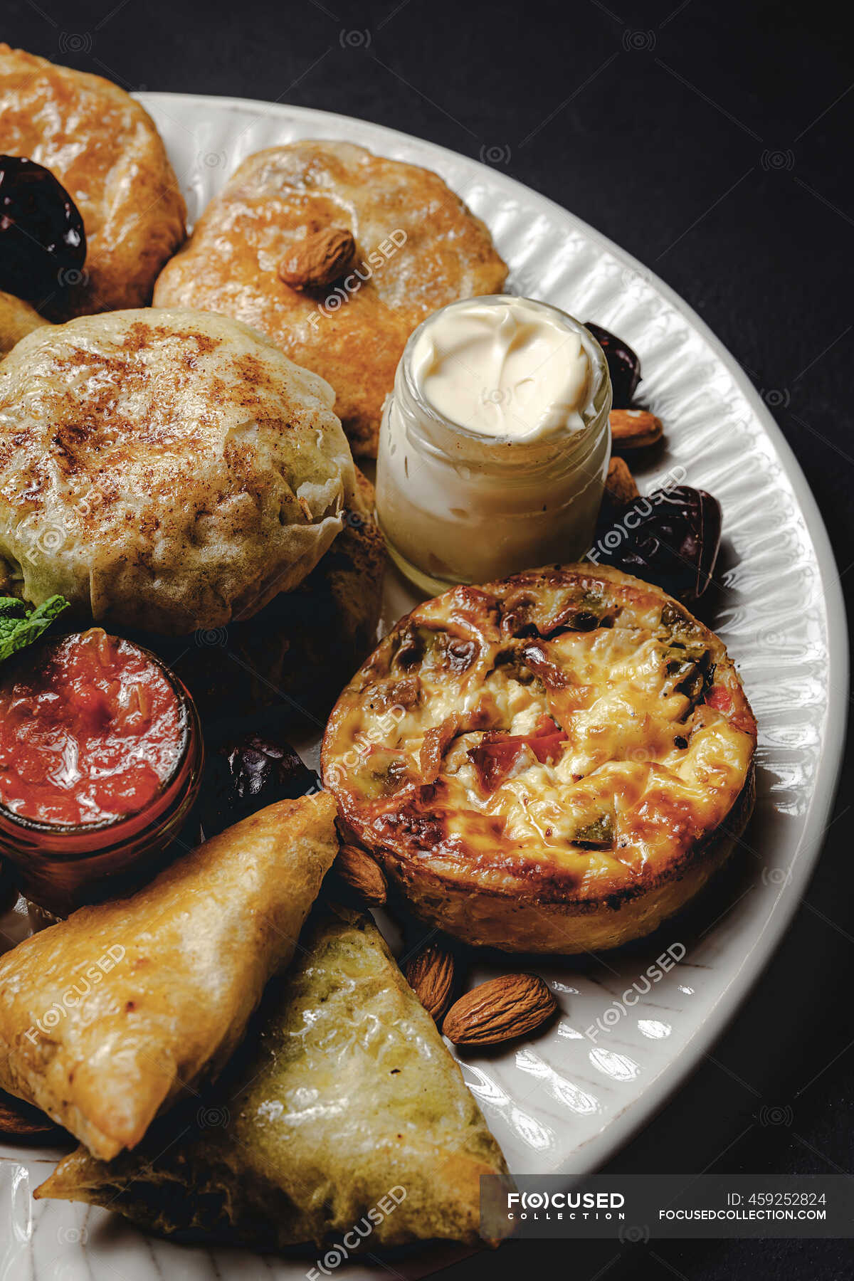 High angle of assorted tasty Arabic food with salsa and fresh mint ...