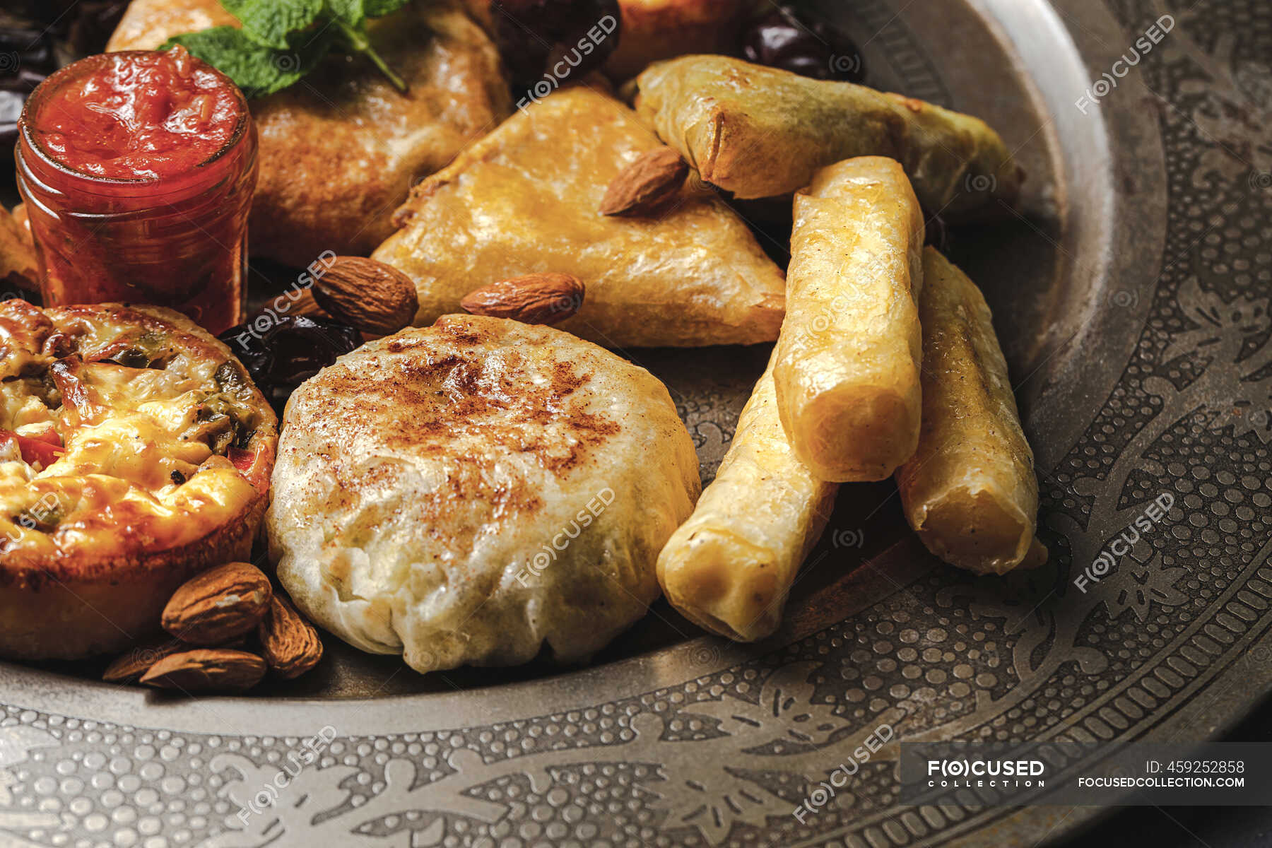 High angle of assorted tasty Arabic food with salsa and fresh mint ...