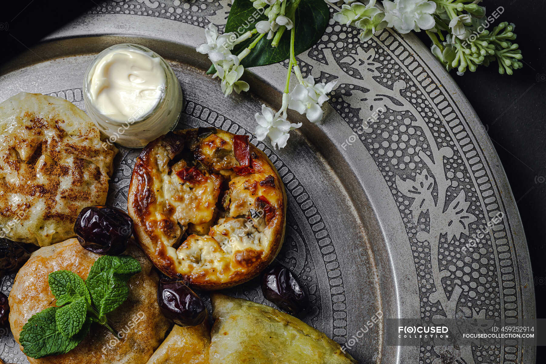 High angle of assorted tasty Arabic food with salsa and fresh mint ...