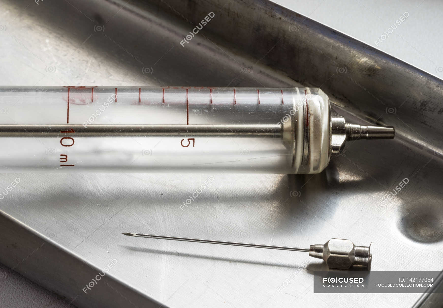 Vintage glass syringe and medecal needle — health, instrument - Stock ...
