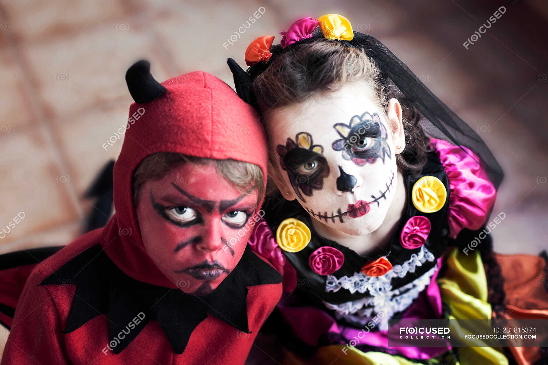 Boy and girl in Halloween fancy dress costumes — friends, Hispanic ...